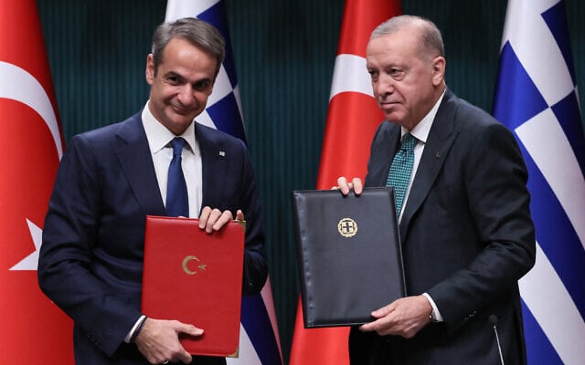 Turkish and Greek leaders hold talks, voice desire to resolve maritime ...