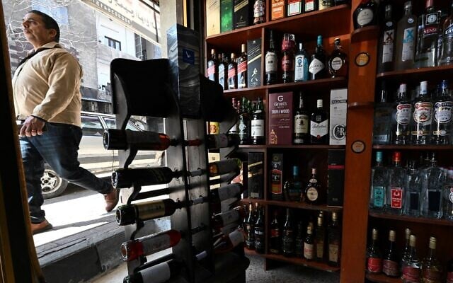 Syria's Damascus restricts sale of alcohol under new Islamist rulers ...