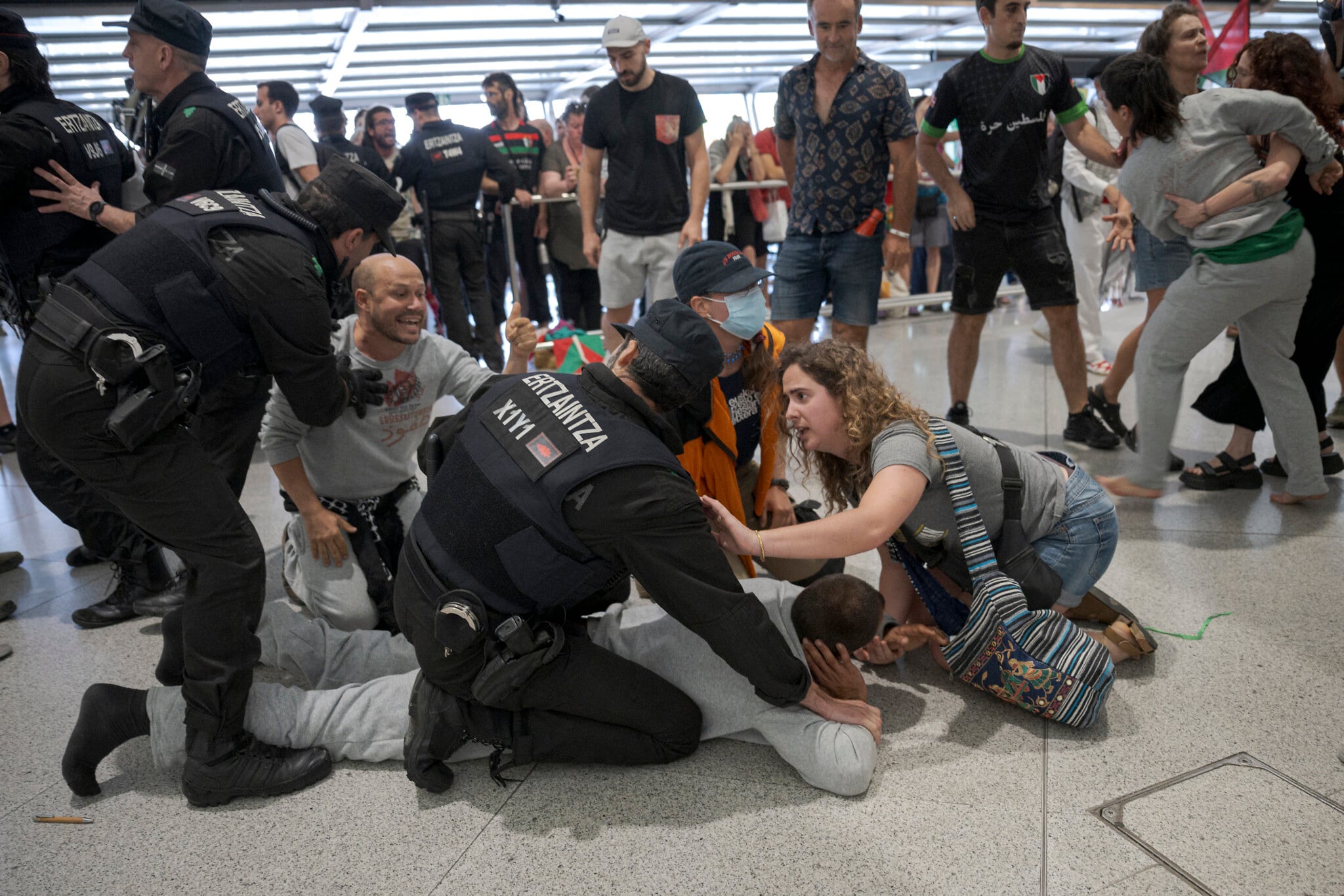 Spanish police beat and detain returning Gaza flotilla activists amid ...