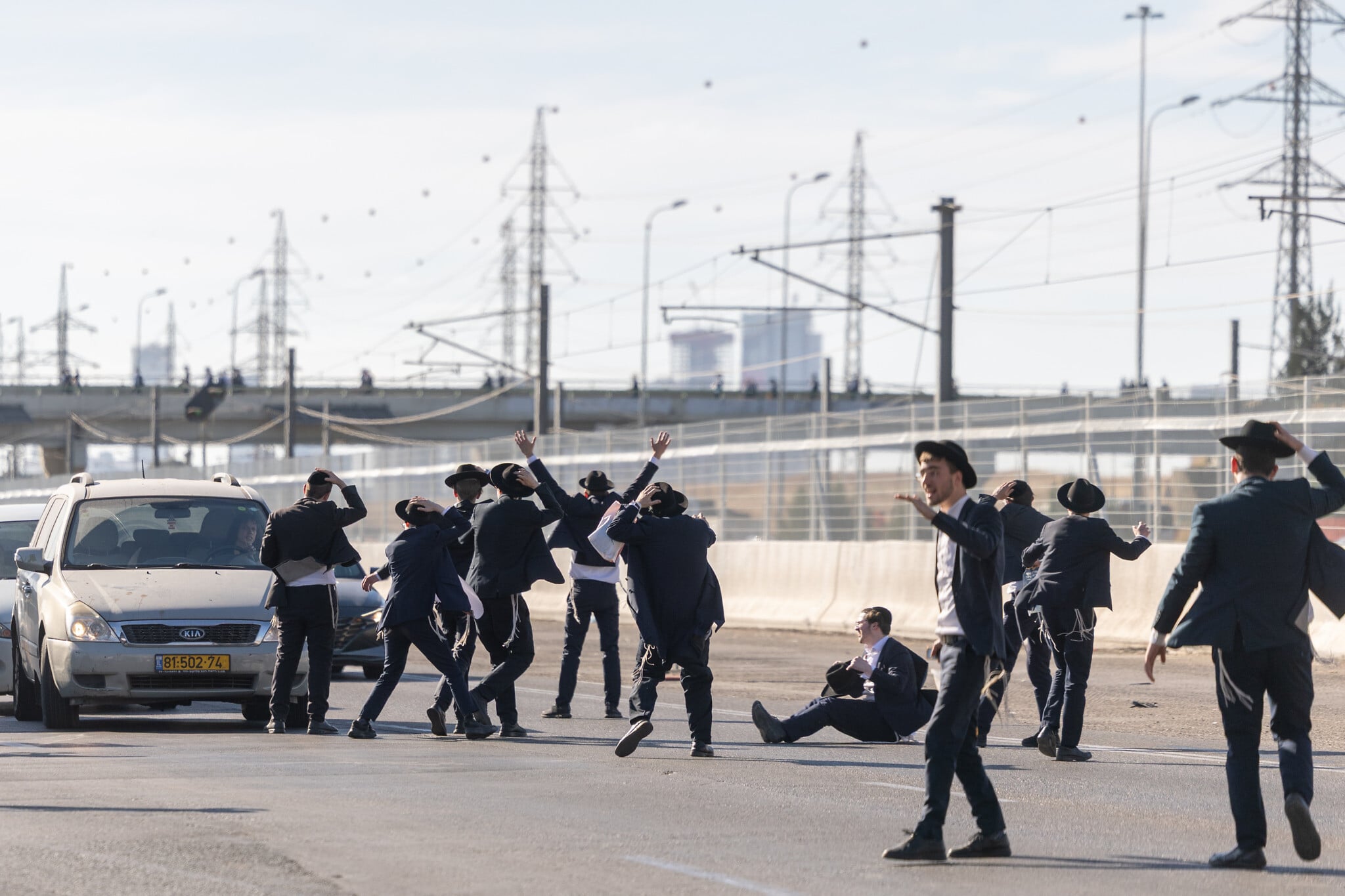 Mass ultra-Orthodox protests block roads, halt traffic over arrest of ...