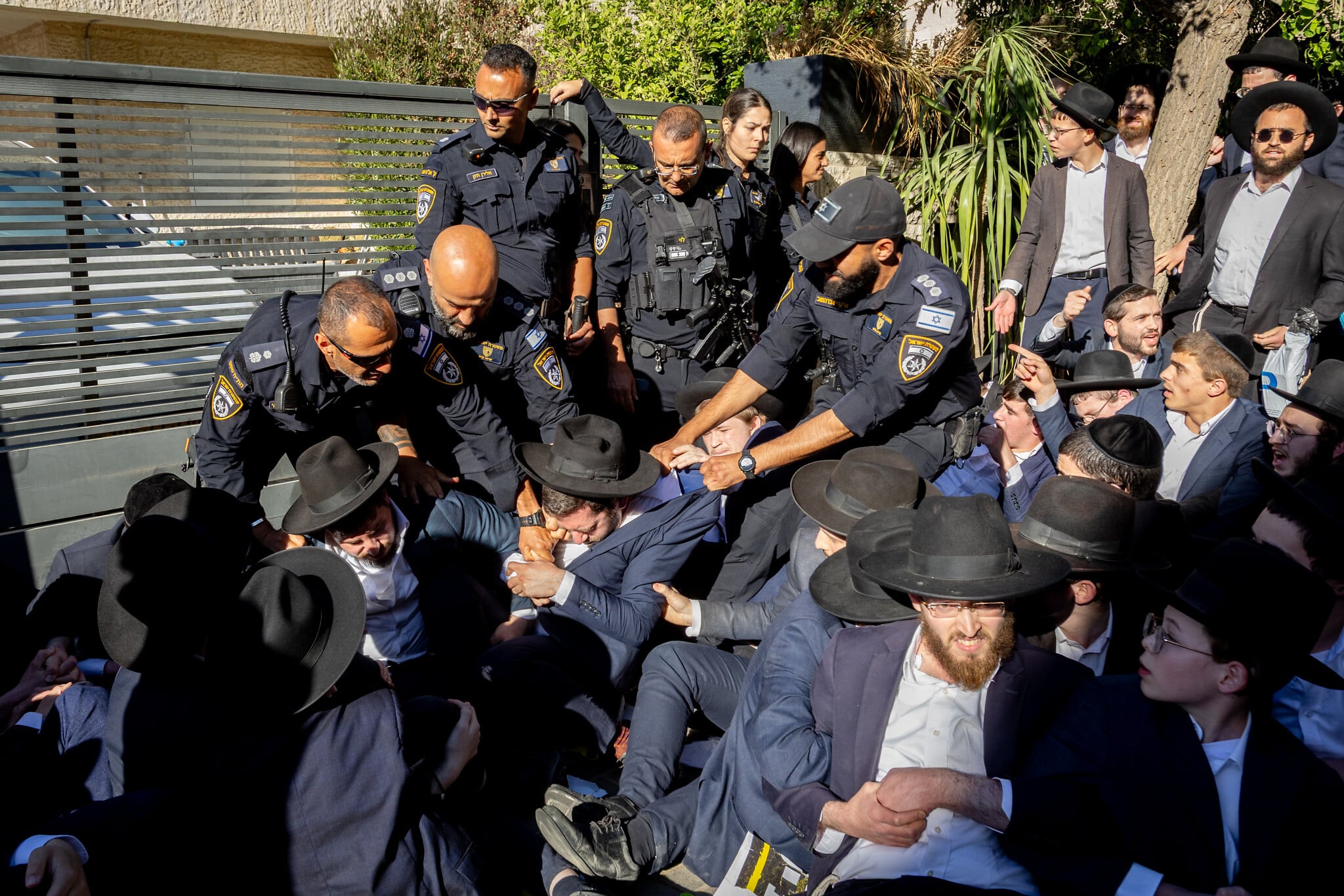 Mass ultra-Orthodox protests block roads, halt traffic over arrest of ...